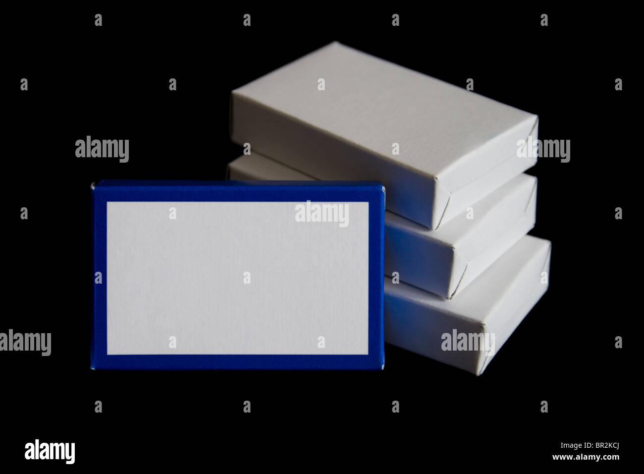 Blue and white carton boxes isolated on black background Stock Photo ...