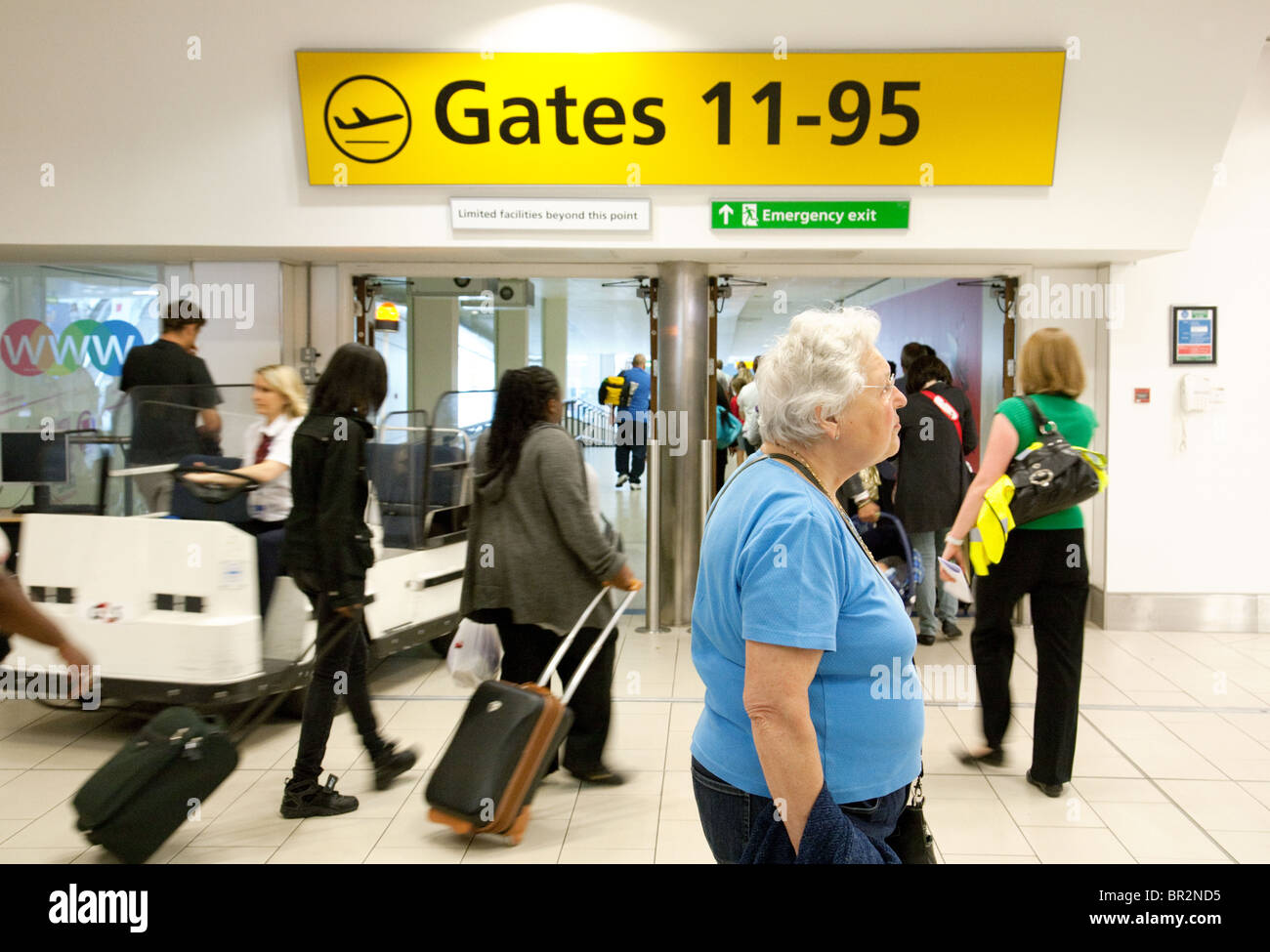 Air passengers heading to their gates, South Terminal, Gatwick airport ...