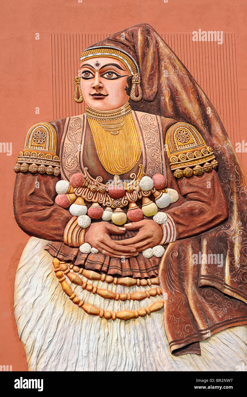 Modern painted bas relief of an Indian woman in traditional dress ...