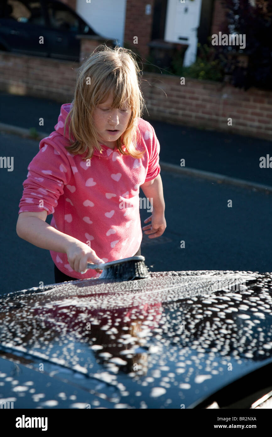 Child washing car bucket hi-res stock photography and images - Alamy