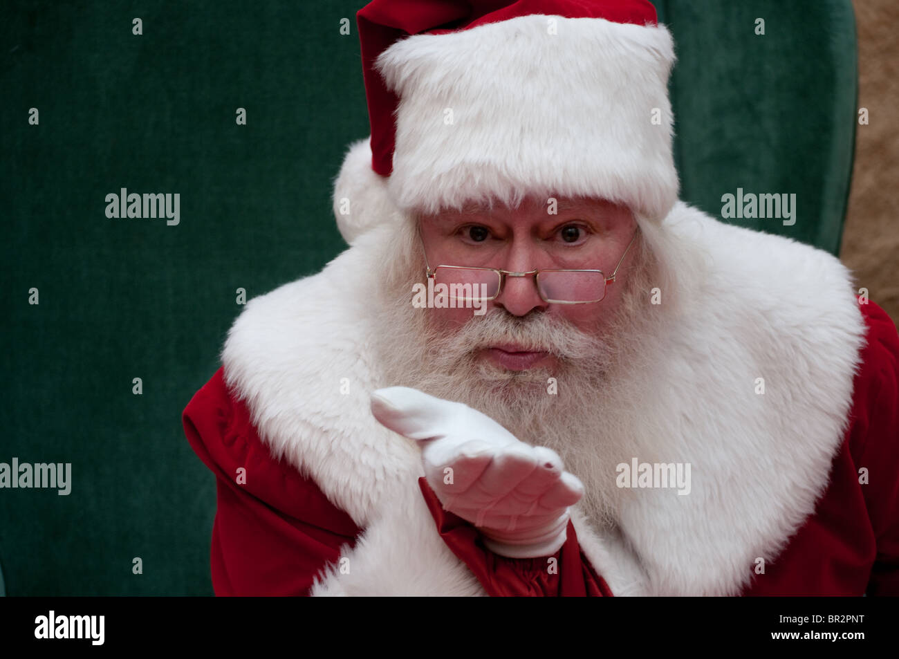 Santa blowing a kiss Stock Photo - Alamy