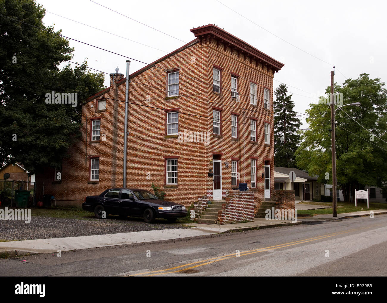 Old town brick duplex house Stock Photo - Alamy
