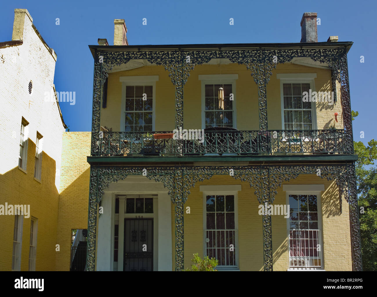 Front of house with wrought iron Stock Photo - Alamy