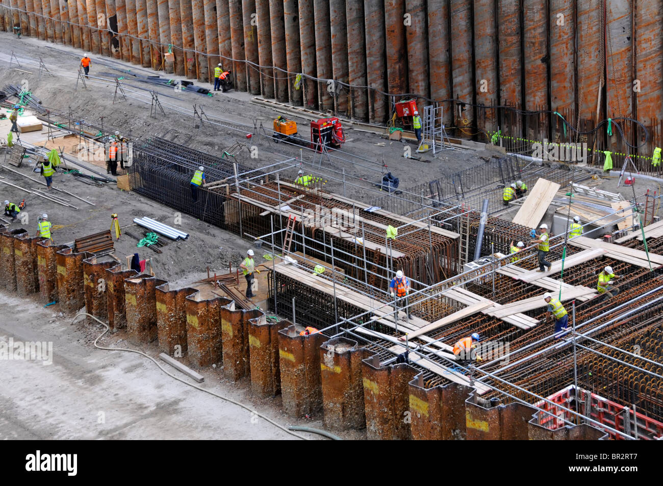 Building construction industry infrastructure site workers in cofferdam ...