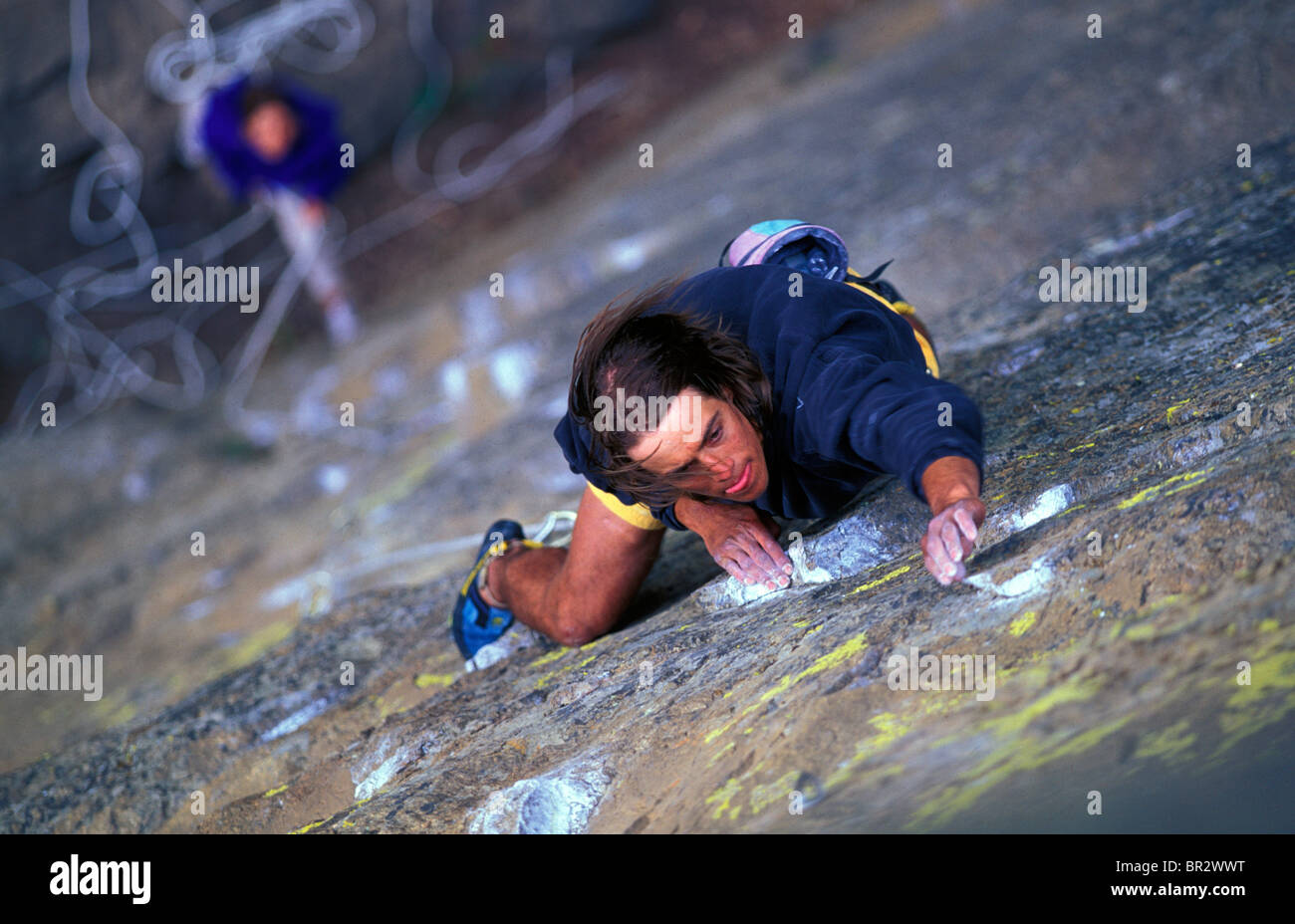 High angle perspective of a man lead climbing Stock Photo - Alamy
