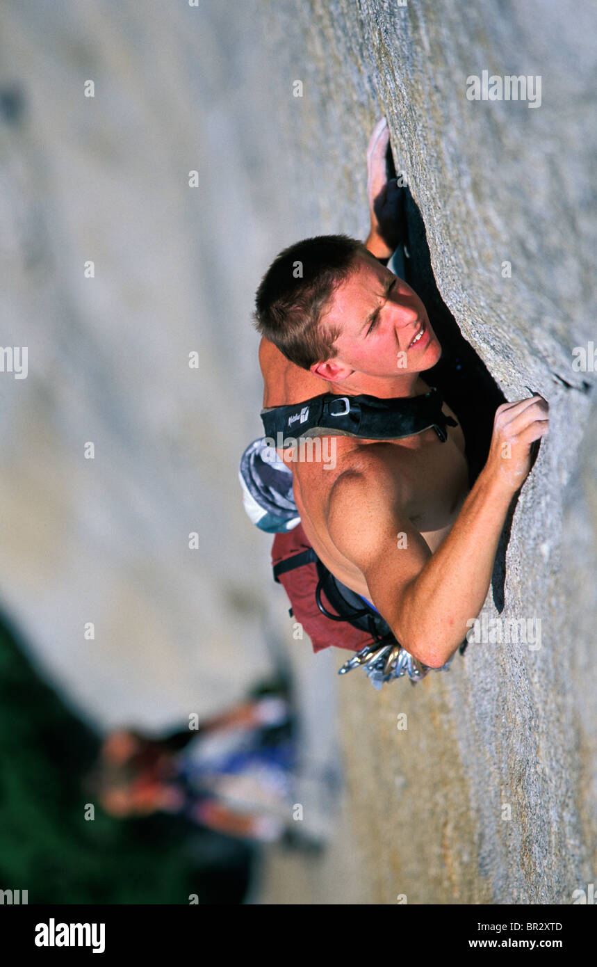 Man climbing on wall escape hi-res stock photography and images - Alamy