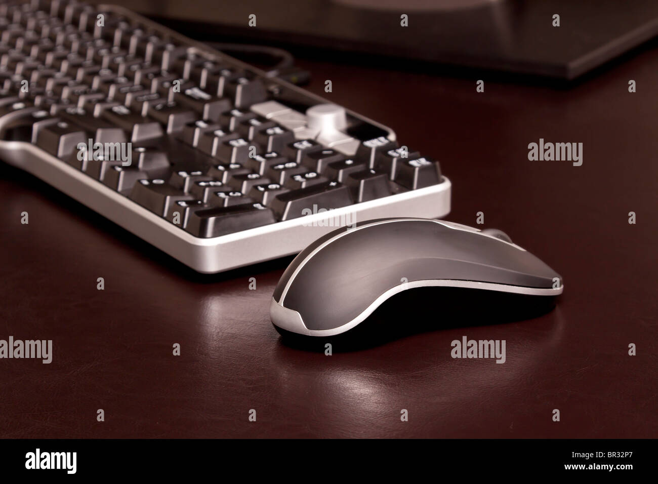 Mouse and keyboard on a work desk Stock Photo - Alamy