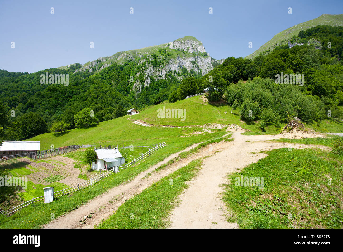 Landscape with village houses on mountains Stock Photo - Alamy