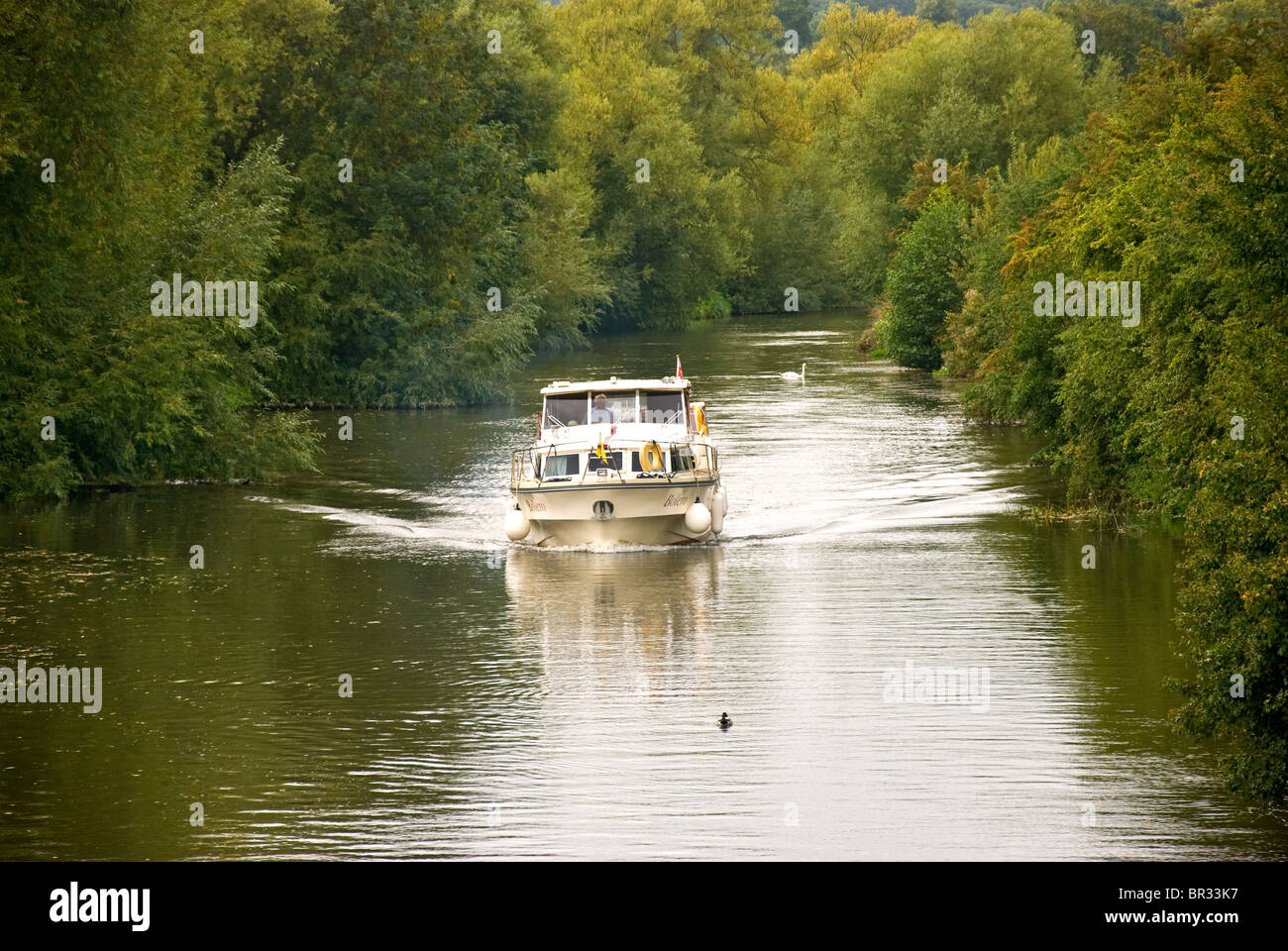 Boat on a river Stock Photo - Alamy