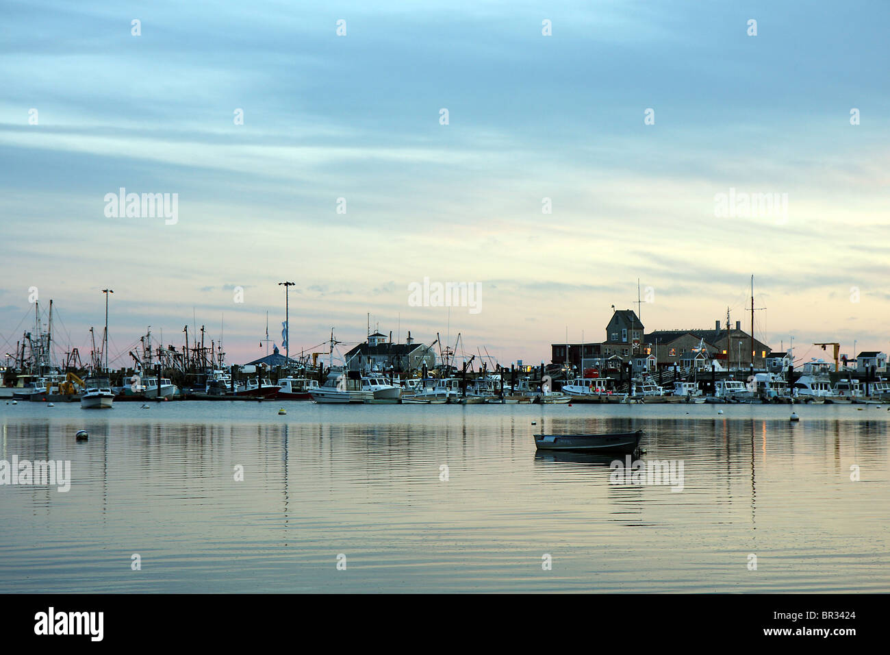 View at Provincetown to the boats and the ocean at sunset Stock Photo ...