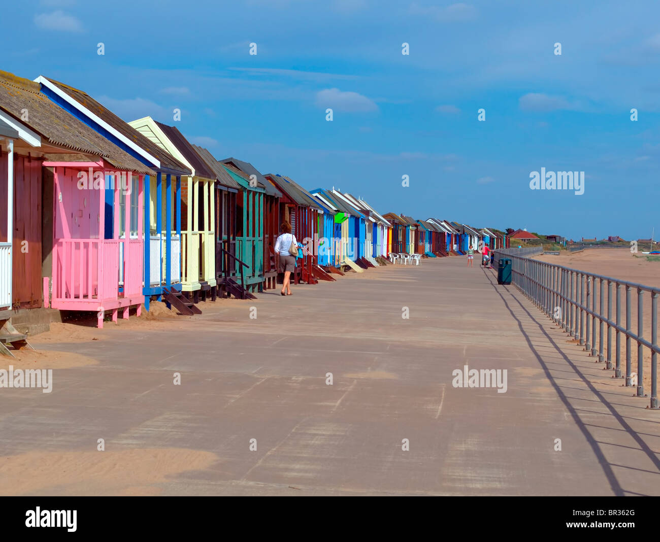 Rows of beach huts on the promenade at Sutton-on-sea,Lincolnshire,UK ...