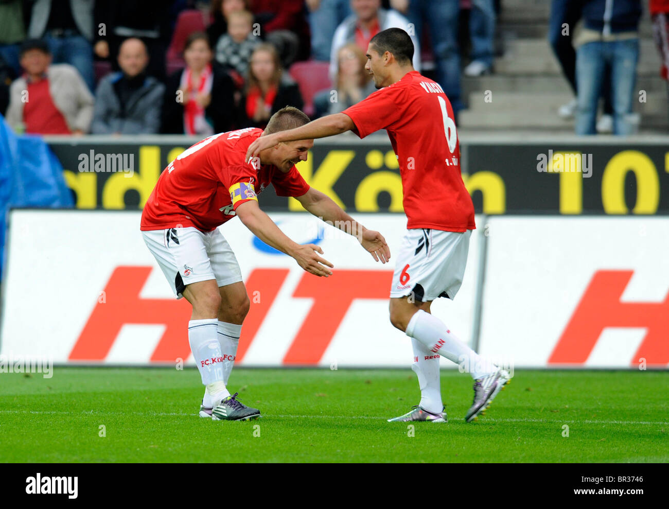 Cologne players Lukas Podolski and Taner Yalcin (from left) are ...