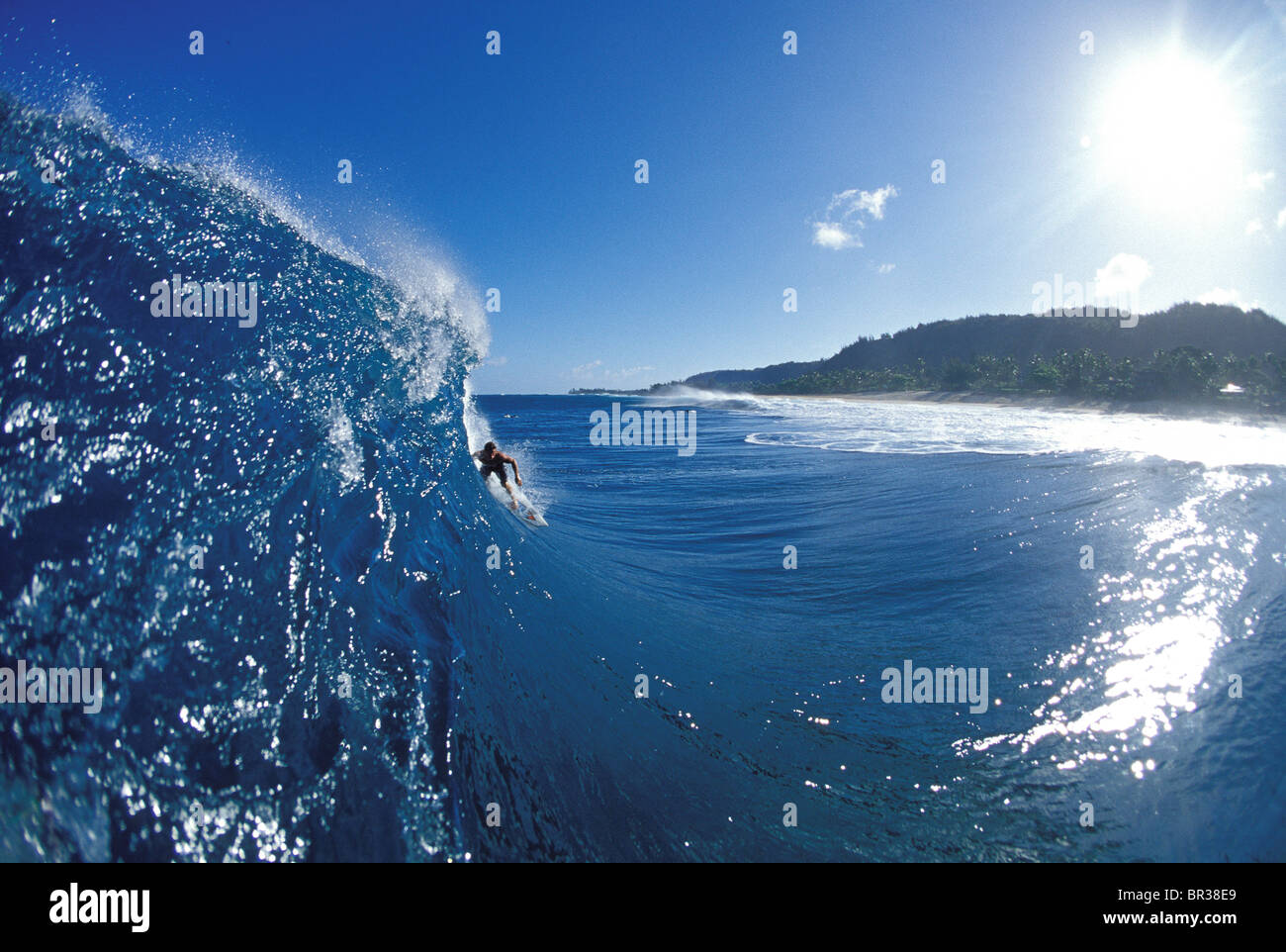 surfing big waves in Hawaii Stock Photo - Alamy
