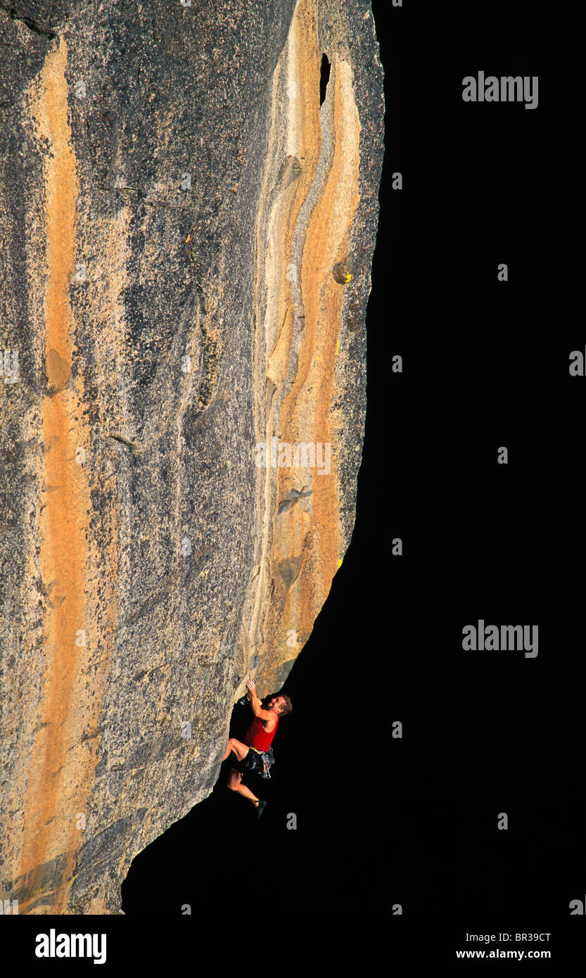Male climber lead climbing on a big wall Stock Photo - Alamy