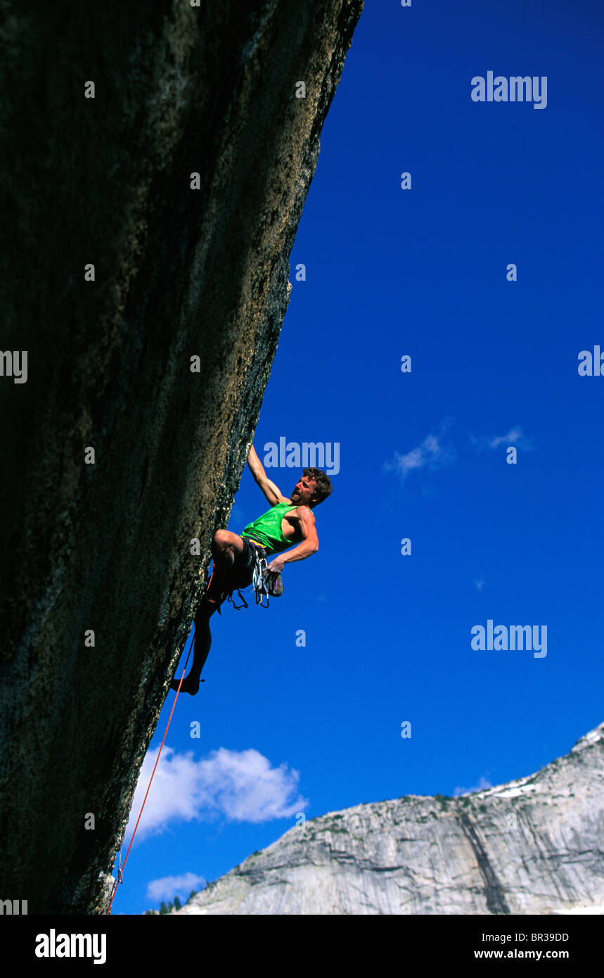 Male climber lead climbing on a big wall Stock Photo - Alamy