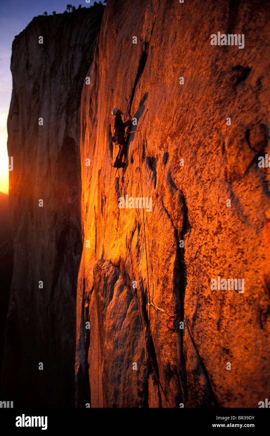 Man climbing on wall escape hi-res stock photography and images - Alamy