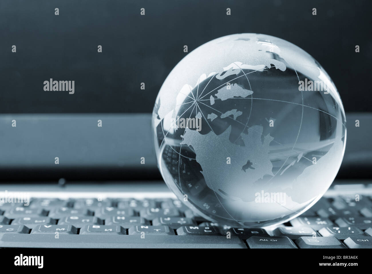 Globe and keyboard Stock Photo - Alamy