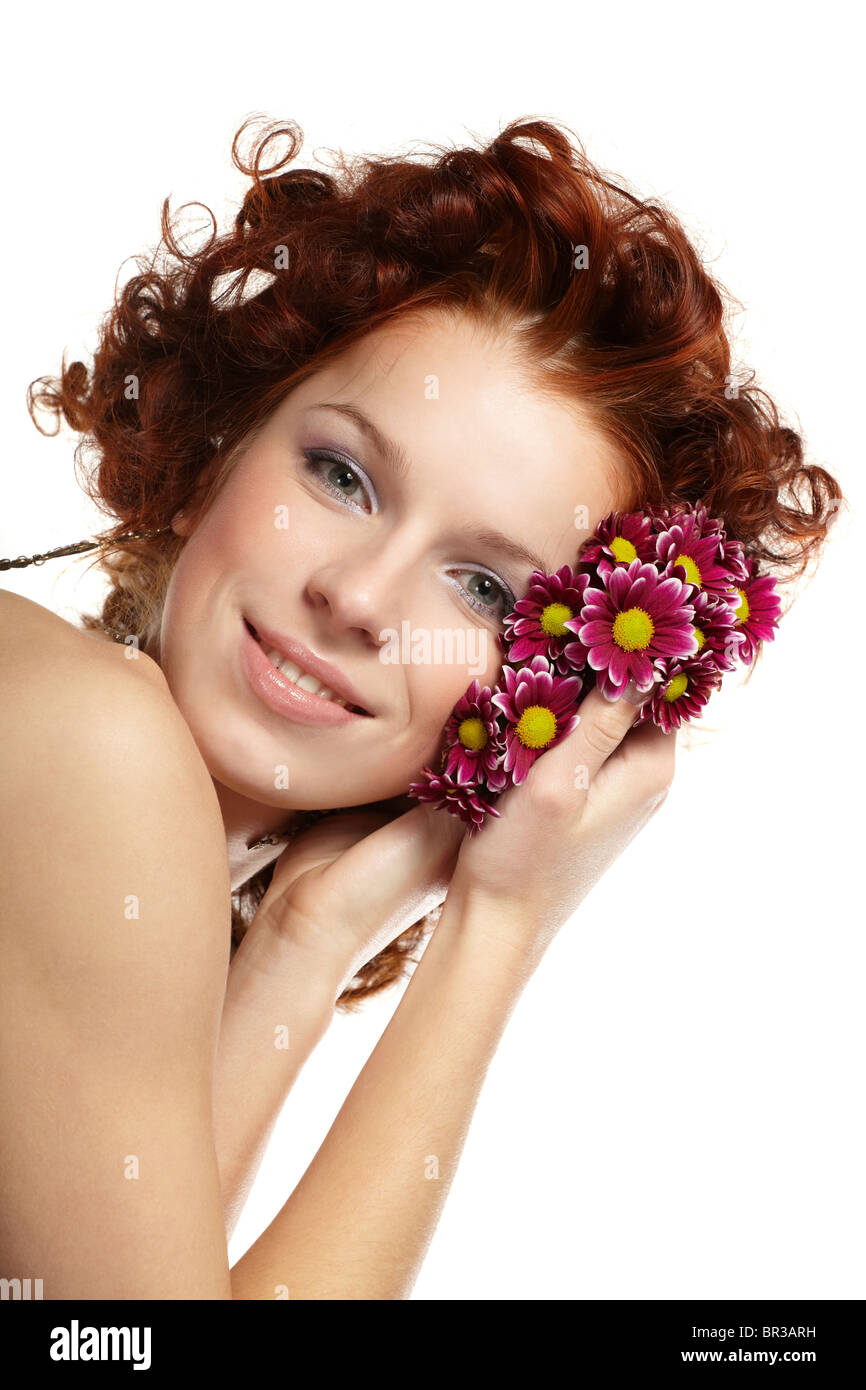 Portrait of a happy women with flowers Stock Photo - Alamy