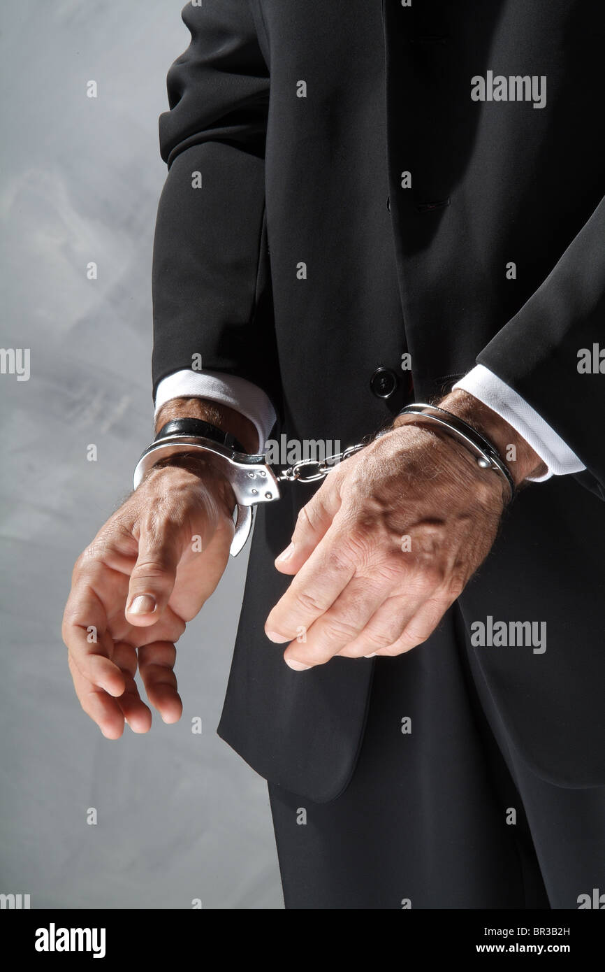 A handcuffed man Stock Photo - Alamy