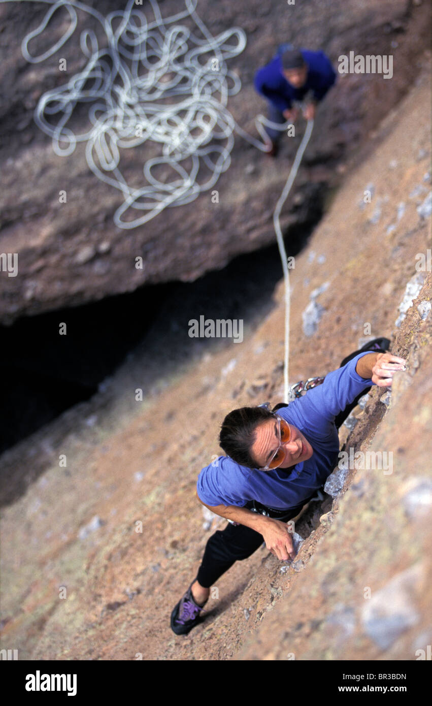High angle perspective of a female lead climbing Stock Photo - Alamy