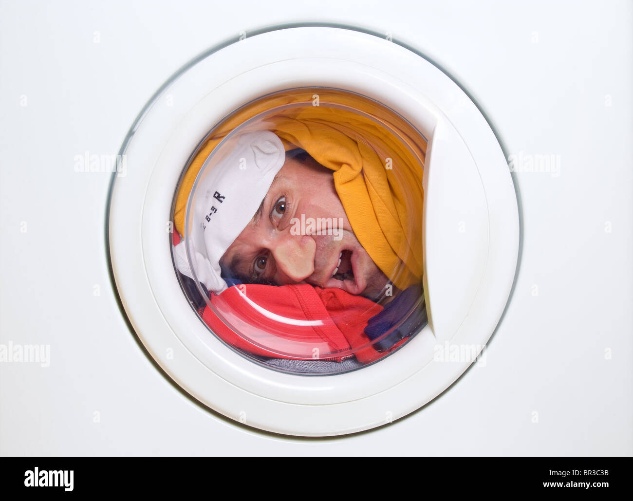 man in a washing machine Stock Photo - Alamy