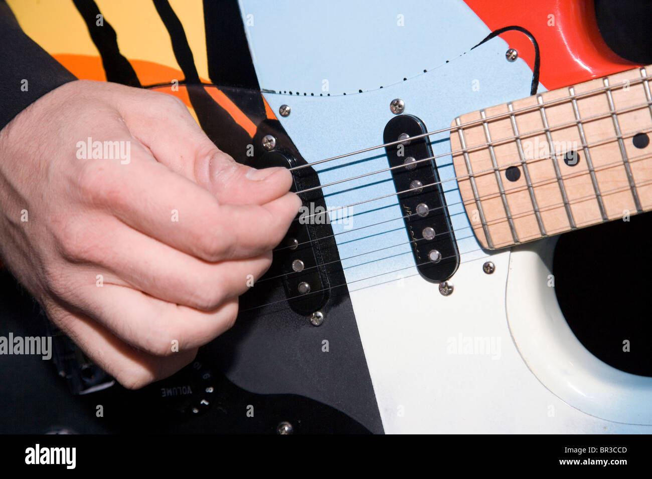 An Electric Guitar being Played Stock Photo - Alamy