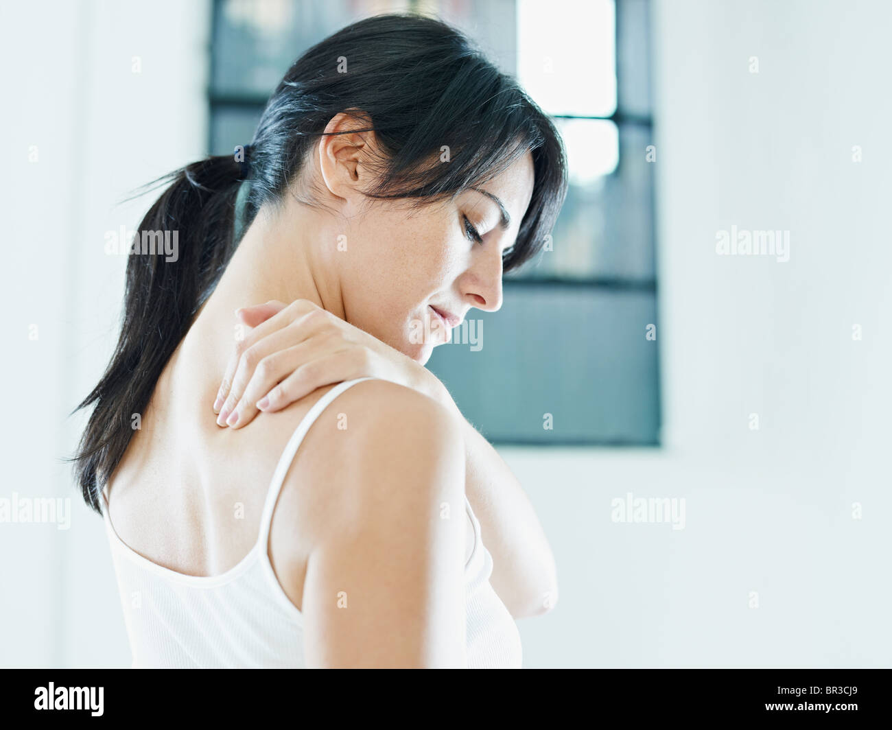 woman having backache Stock Photo - Alamy
