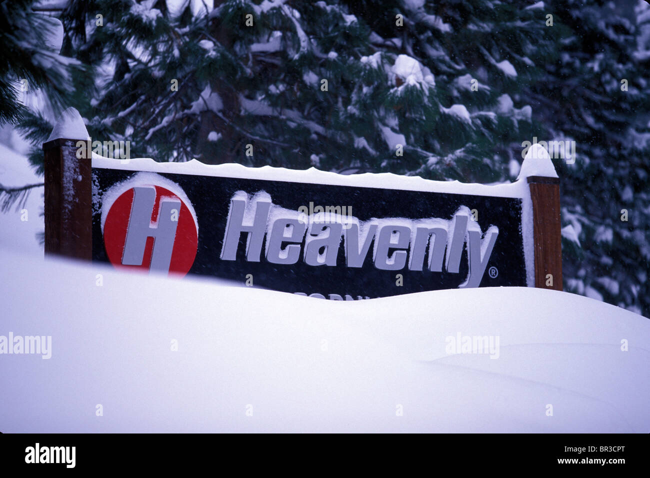 Resort sign covered in snow Stock Photo - Alamy