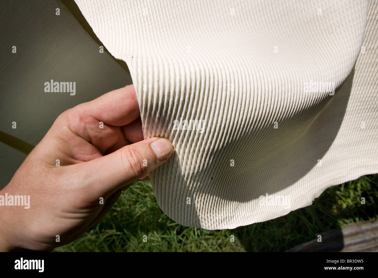 Rubber cake with hand. Latex cake, Rubber Production: Tapping rubber ...