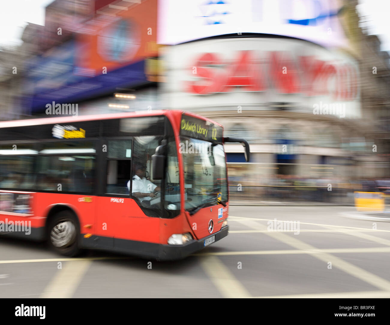 London bus at speed through Piccadilly Circus Stock Photo - Alamy
