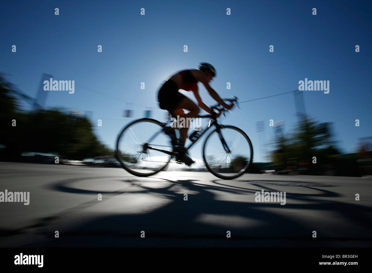 Female triathlete competes in bicycle leg of the first annual 2007 ...