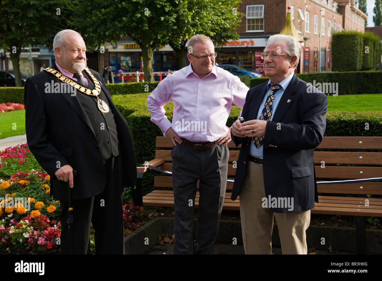 Local dignitaries unveil a memorial bench in memory of photographer ...
