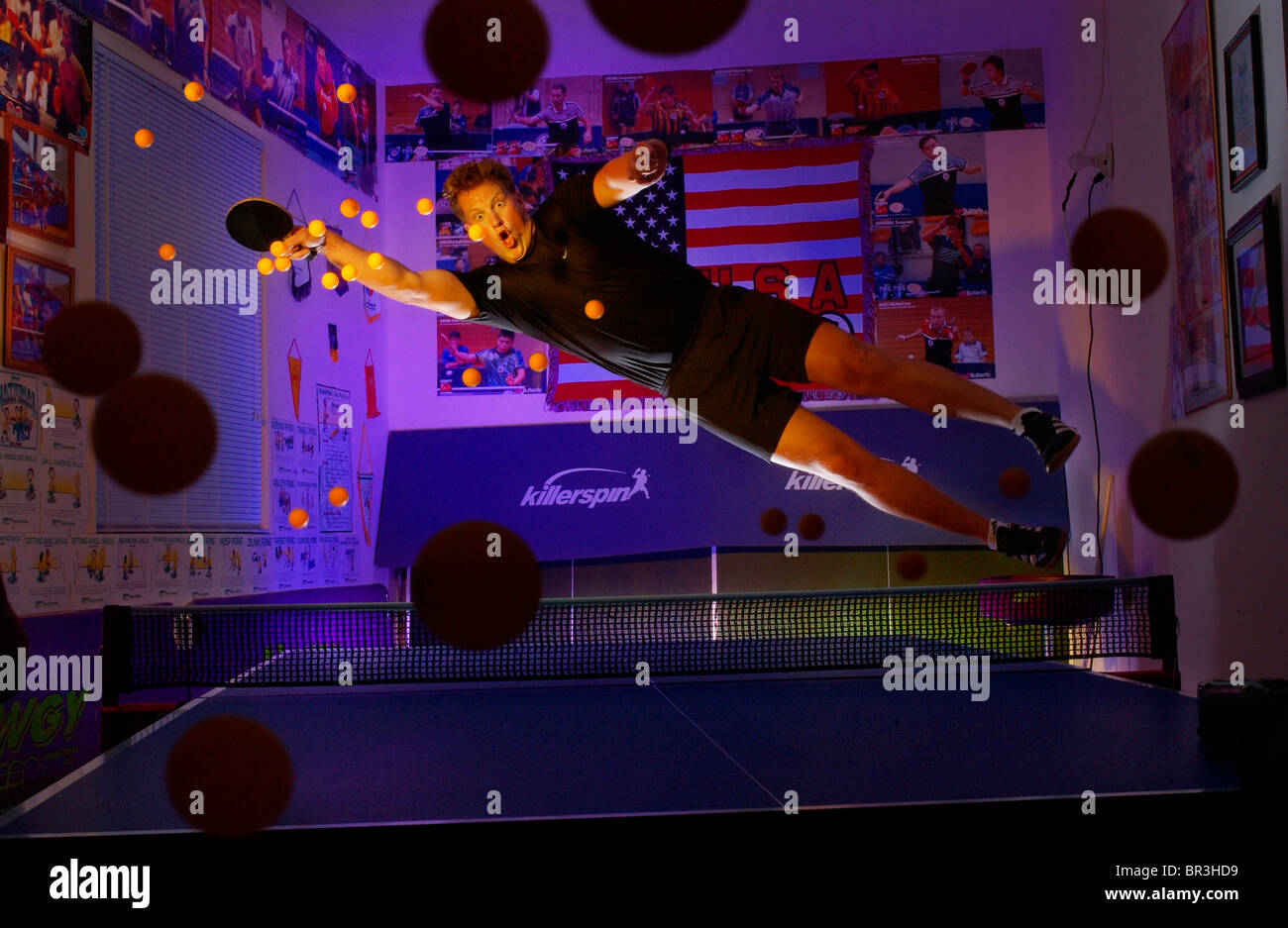 Man plays ping pong Stock Photo - Alamy