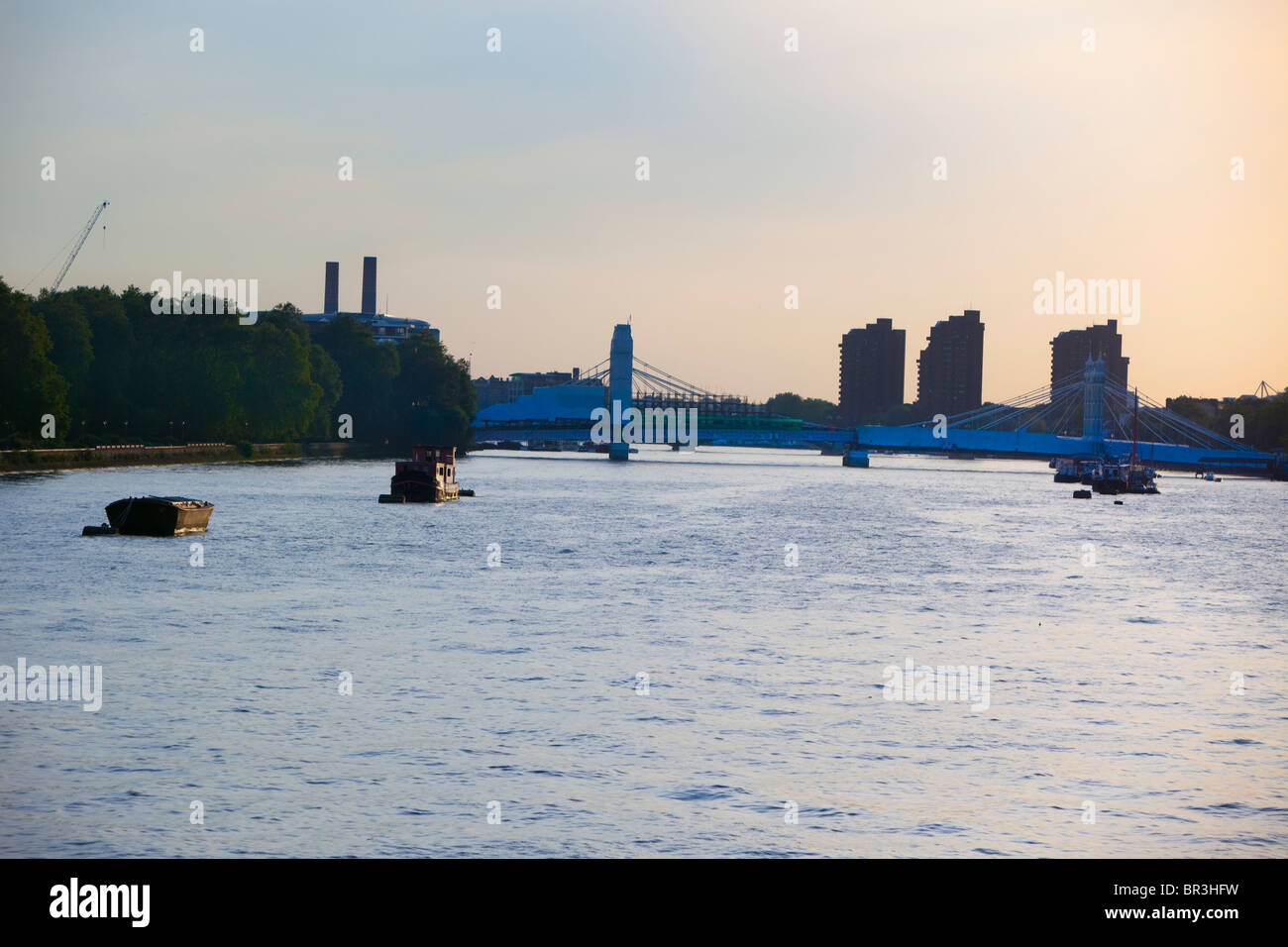 Boat transport in the River Thames at dusk, London, England, UK Stock ...