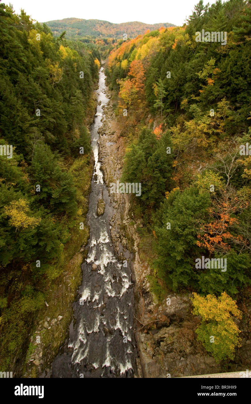 The Ottauquechee River flows through the 165-foot deep Quechee Gorge in ...