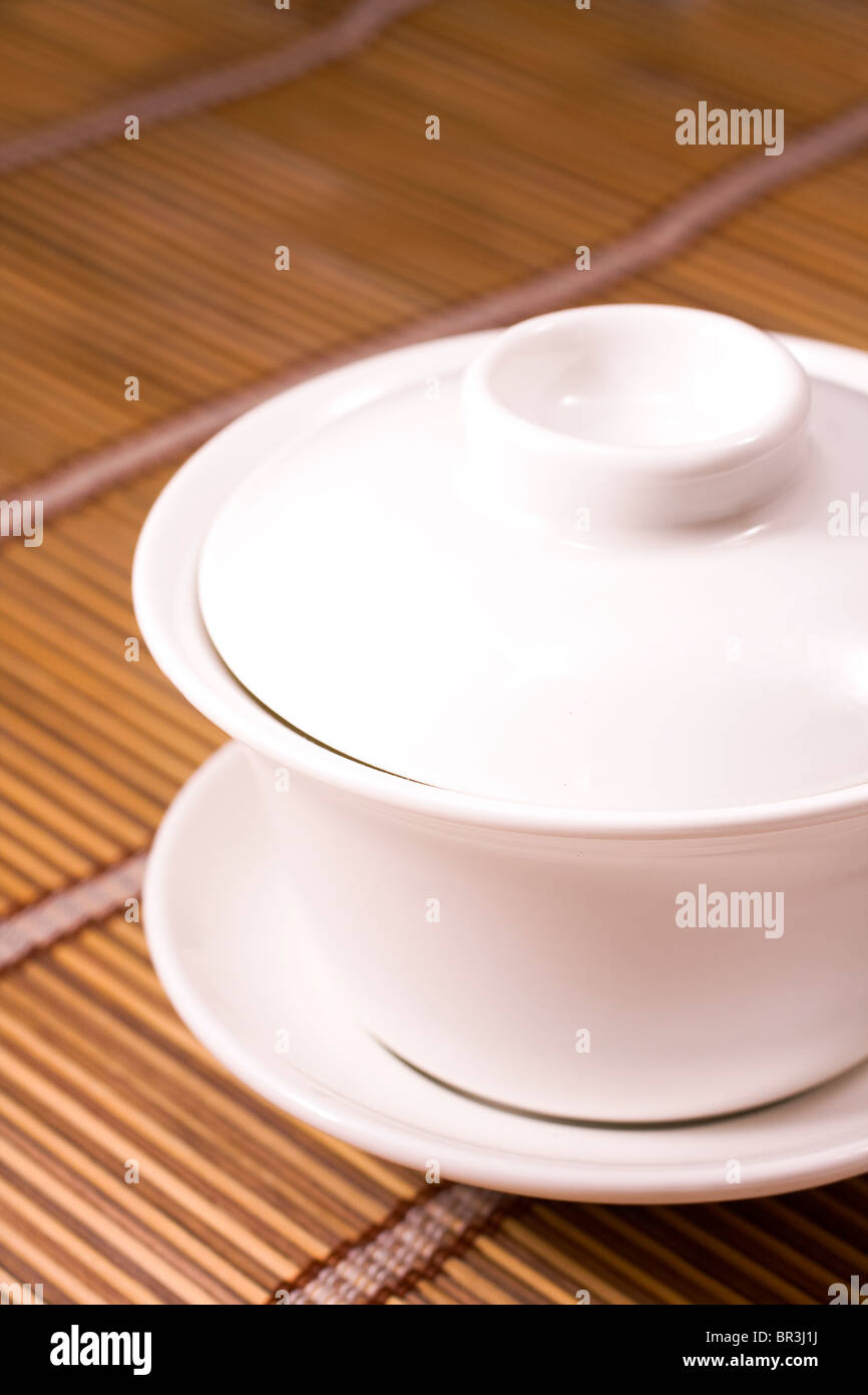 white teacup on wooden table for texture Stock Photo - Alamy