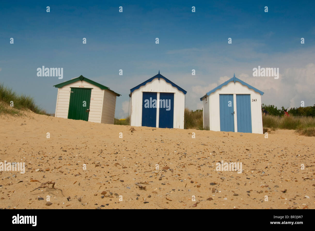 Brightly painted beach huts southwold hi-res stock photography and ...
