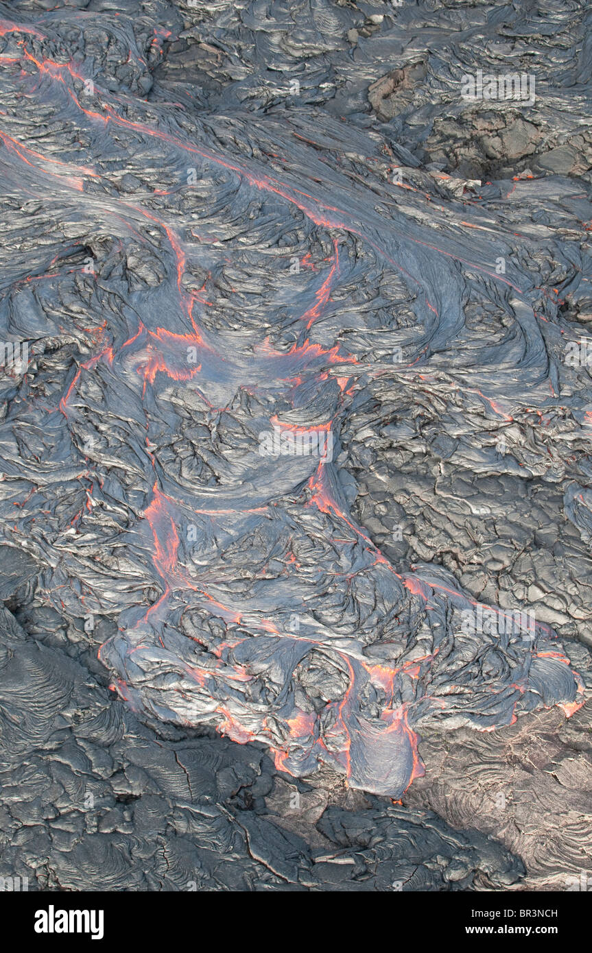 Aerial photograph of lava flowing from PuuOo vent on Hawaii. Located ...