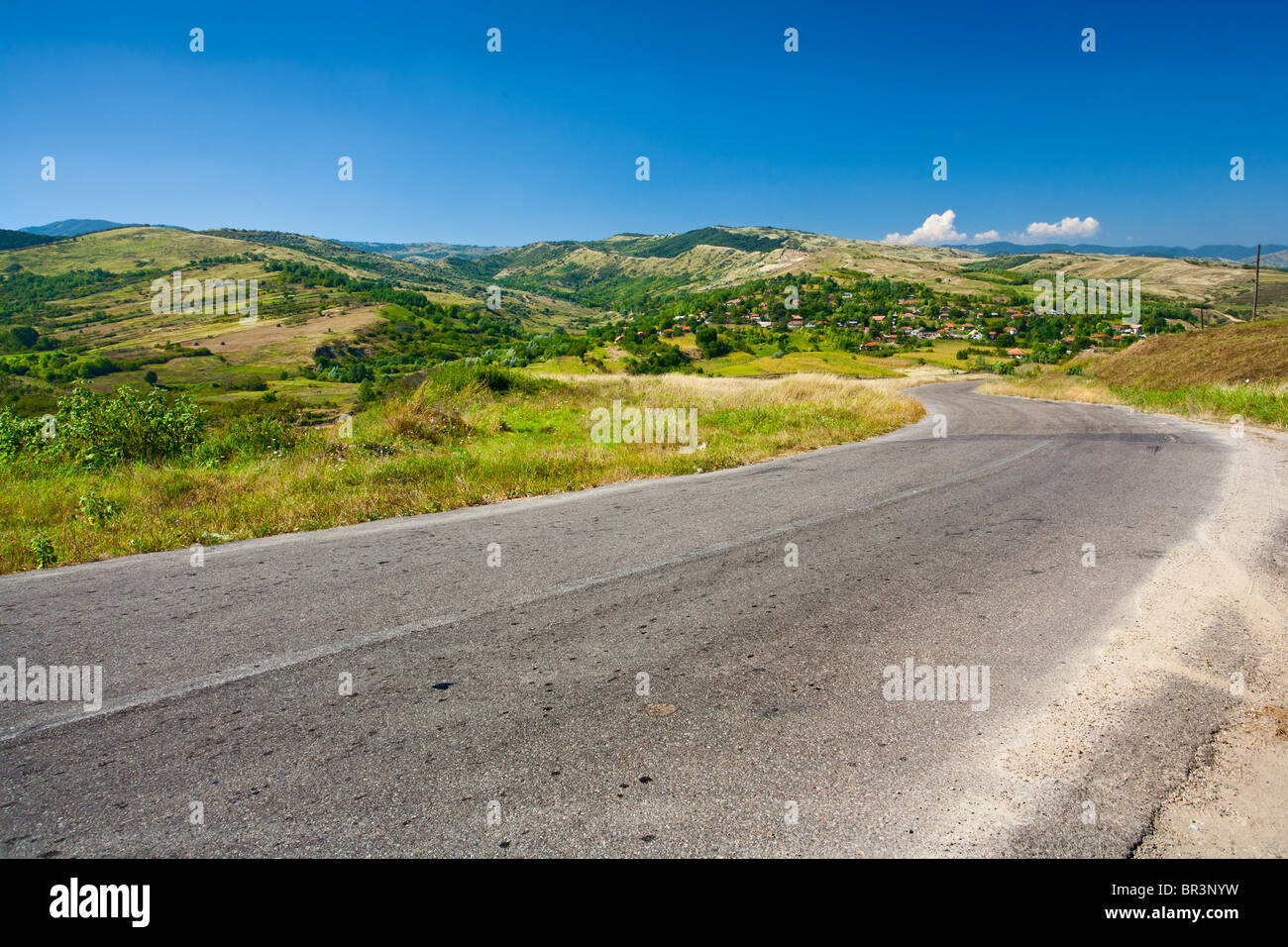 Cloudy day road through hillside hi-res stock photography and images ...
