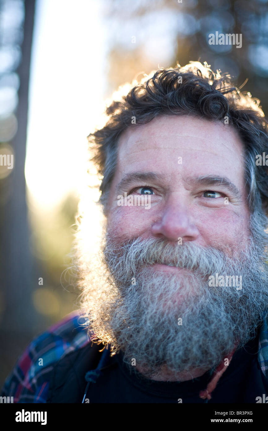 Portrait of bearded man in woods Stock Photo - Alamy