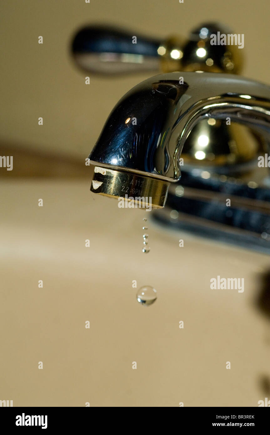 Close up of water dripping from faucet hi-res stock photography and ...