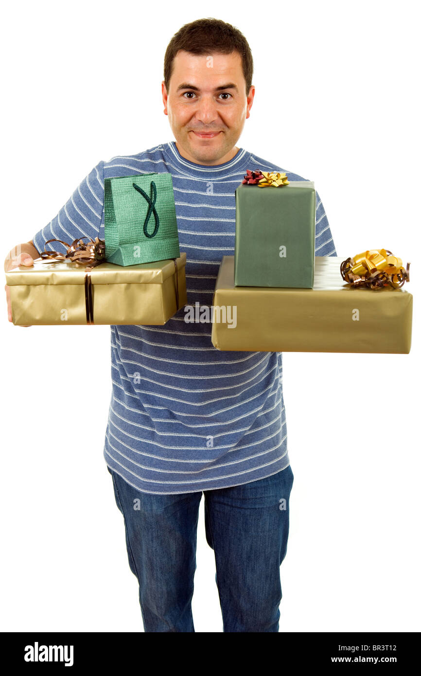 young casual man holding a few gifts, isolated Stock Photo - Alamy