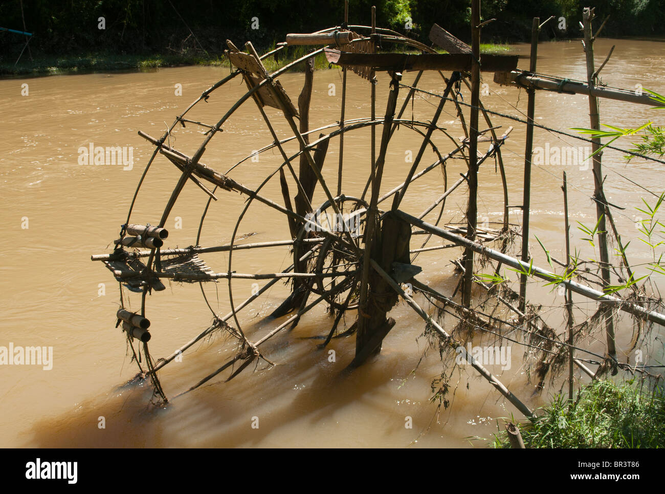 traditional water wheel on the Plain of Jars in Laos Stock Photo - Alamy