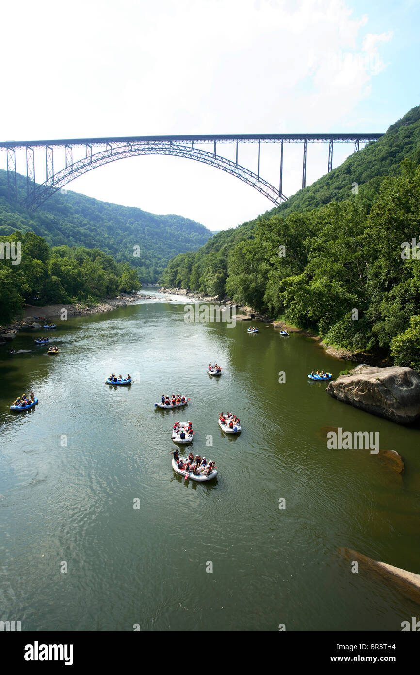 Commercial rafts float down the New River towards the Fayette Station ...