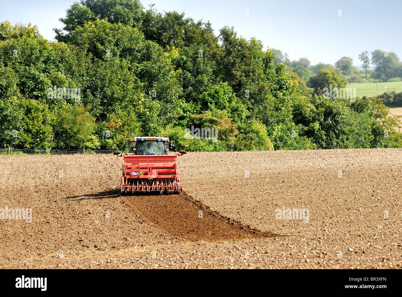 Red tractor field hi-res stock photography and images - Alamy