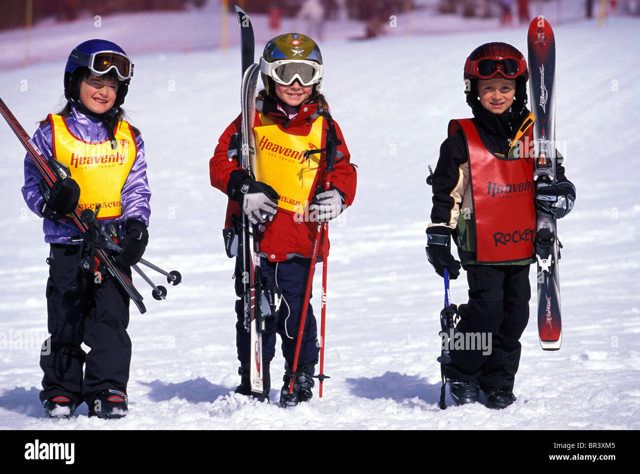 Kids in ski school holding their skis Stock Photo - Alamy
