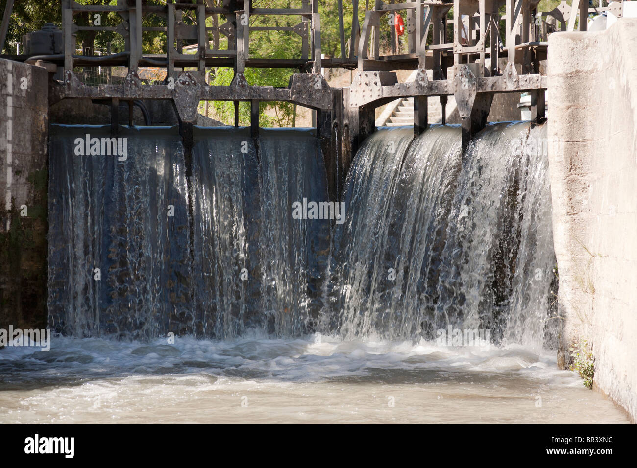 Water cascading over lock gates Stock Photo - Alamy