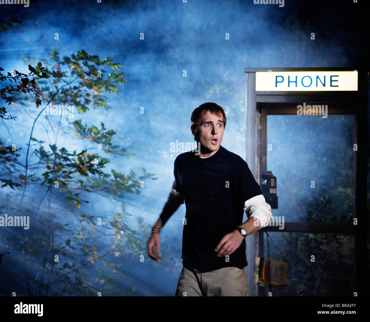 Phone booth night man hi-res stock photography and images - Alamy