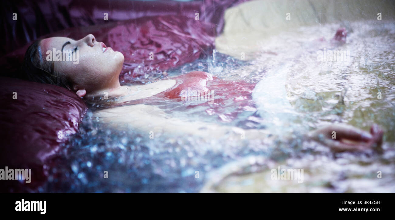 Clothed wet woman hi-res stock photography and images - Alamy