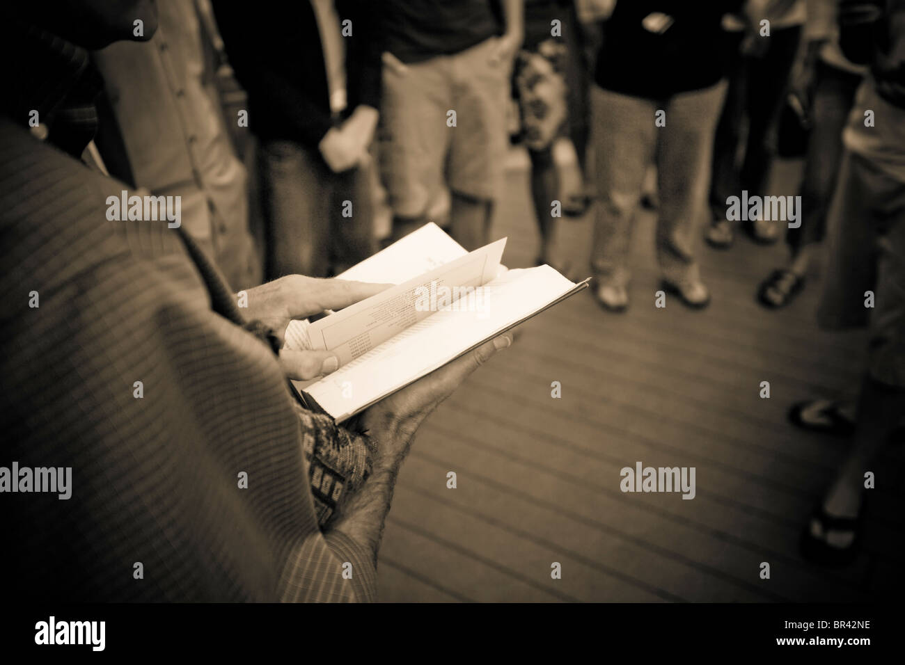 A jewish man reads from the Torah during the festival of Rosh Hashanah ...